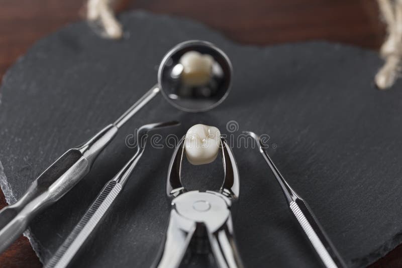 Tooth extraction concept stock image. Image of isolated - 70577367
