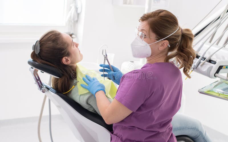Tooth Extraction Using Forceps Closeup Stock Photo - Image of dentistry ...