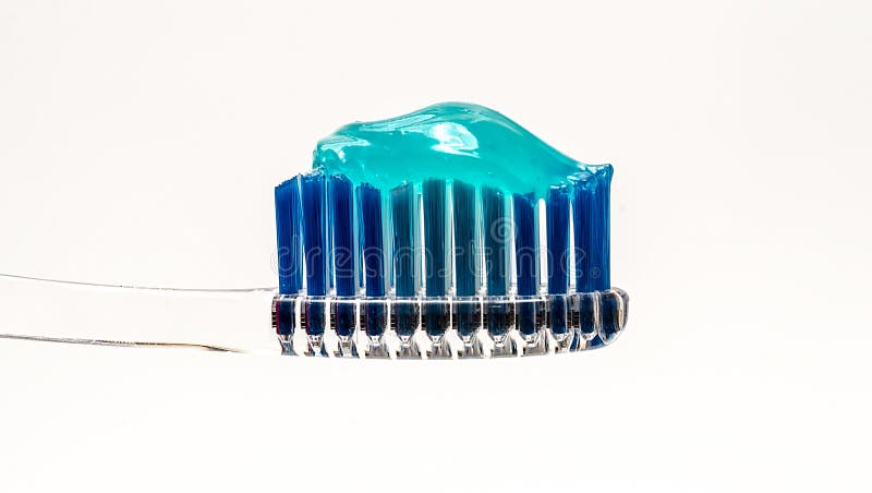 Toothpaste on brush stock photo. Image of dental, fluoride - 50492504