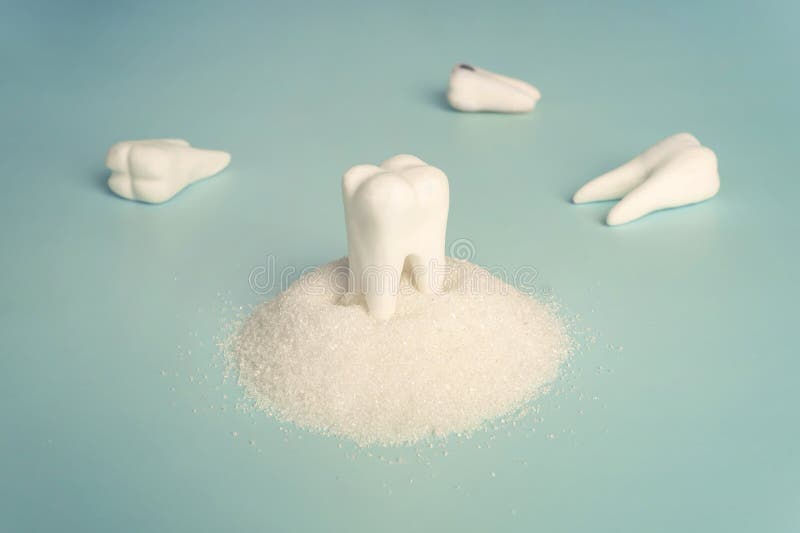 Tooth with Sugar on Blue Background. Harm of Sugar and Sweet for Teeth ...