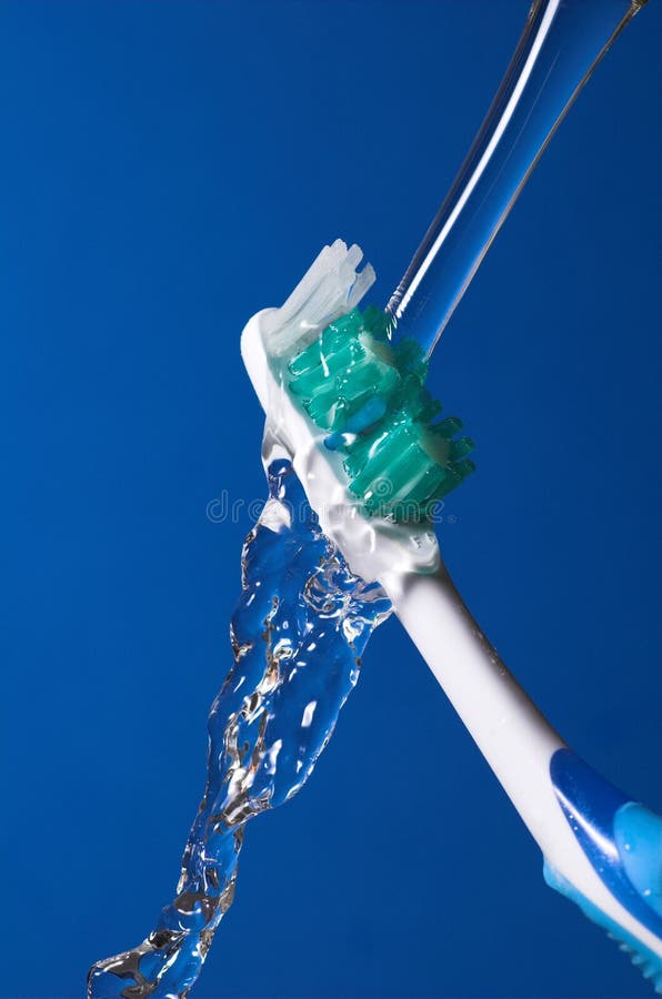 Toothbrush Under Running Water Stock Photo - Image of equipment ...