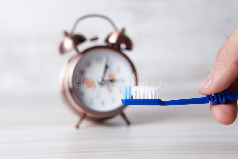 Toothbrush and Alarm Clock Time To Brush Your Teeth Stock Image - Image ...