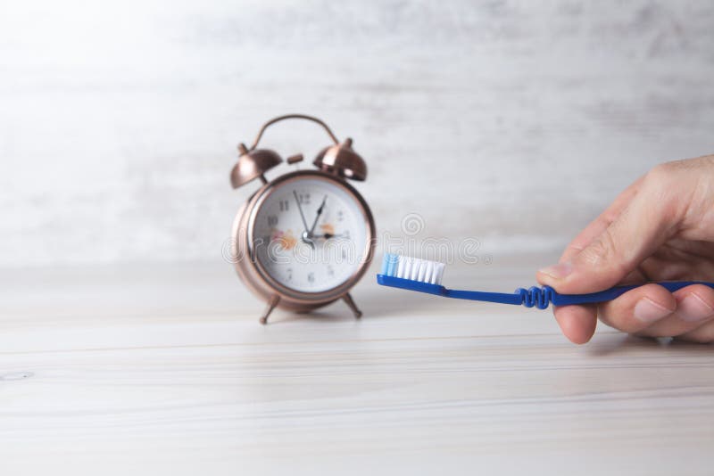 Toothbrush and Alarm Clock Time To Brush Your Teeth Stock Image - Image ...
