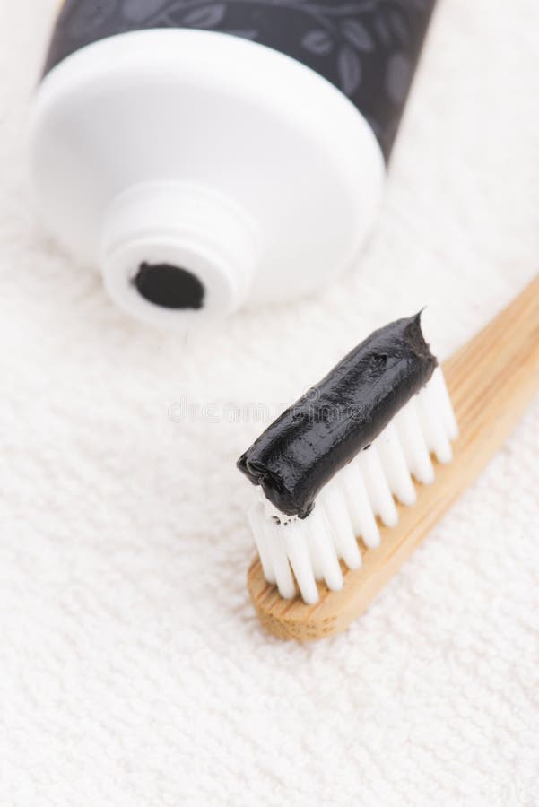 Toothbrush with Black Charcoal Toothpaste Stock Image - Image of ...
