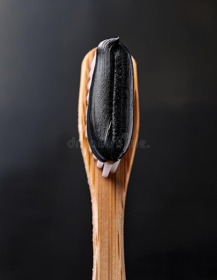 Toothbrush with Black Charcoal Toothpaste. Close Up of Black Toothpaste ...
