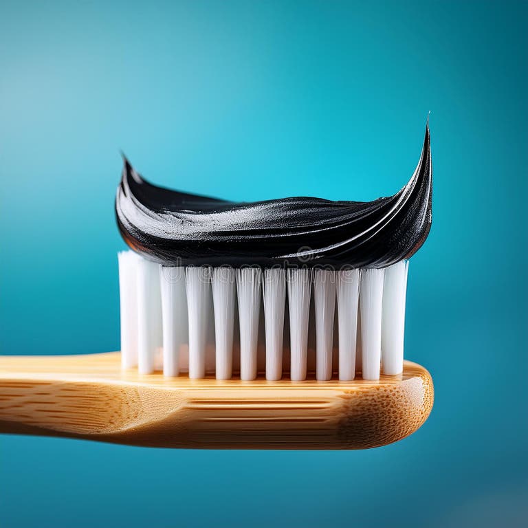 Toothbrush with Black Charcoal Toothpaste. Close Up of Black Toothpaste ...