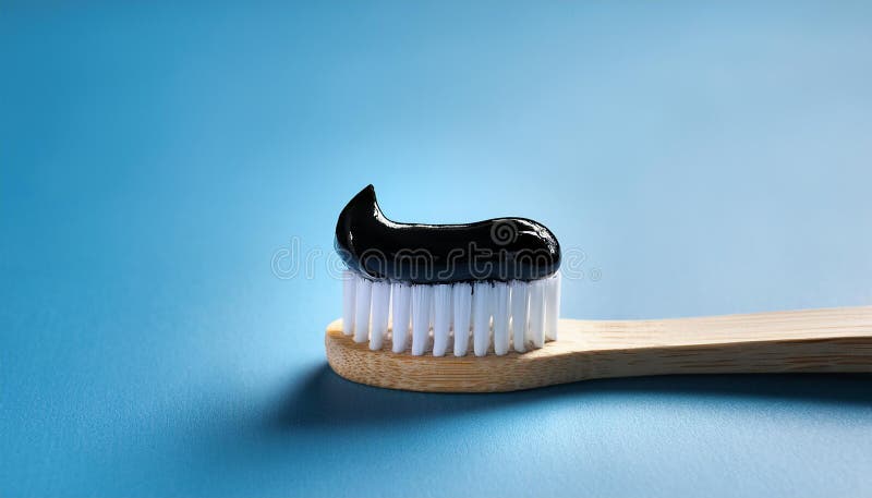 Toothbrush with Black Charcoal Toothpaste. Close Up of Black Toothpaste ...