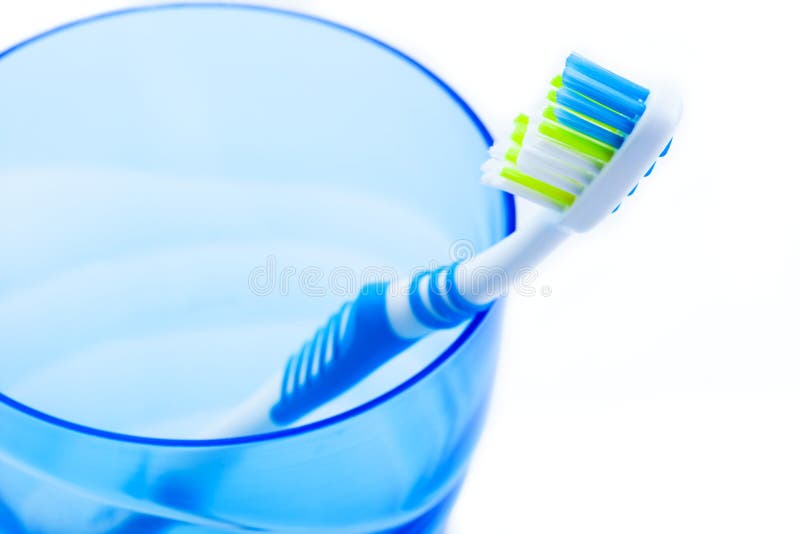 Toothbrush in Blue Plastic Glass Stock Photo - Image of clean, breath ...
