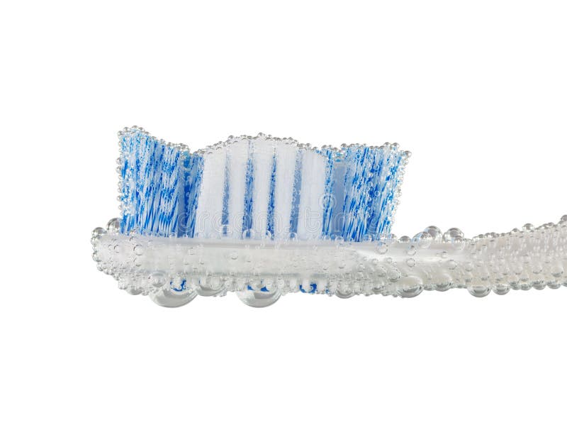 Toothbrush in Bubbles of Air Isolated on White Background. Concept of ...