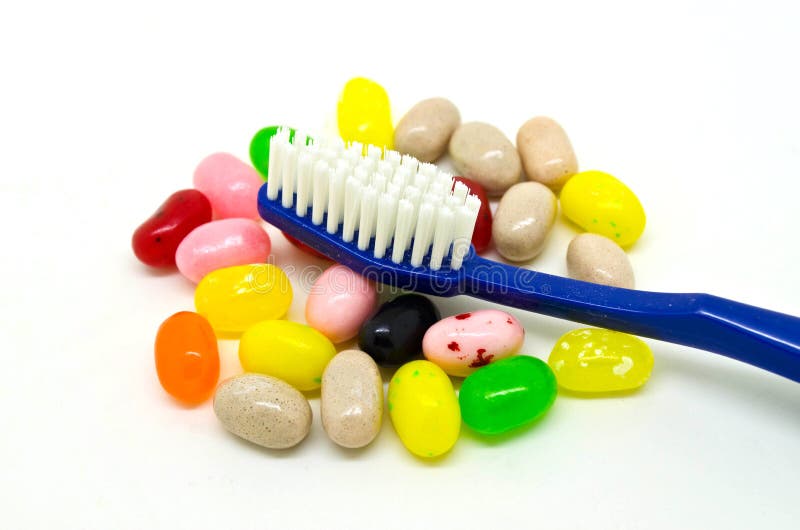 Toothbrush and candies stock photo. Image of medical - 30300200