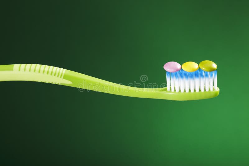Toothbrush and candy stock photo. Image of candy, toothbrush - 40600470
