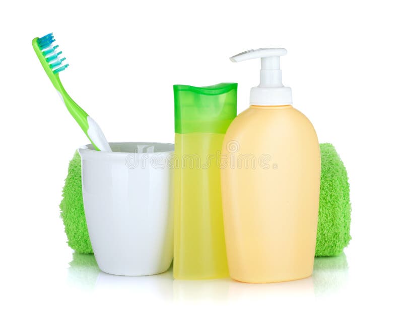 Toothbrush, Cosmetics Bottles and Towel Stock Photo - Image of bathroom ...