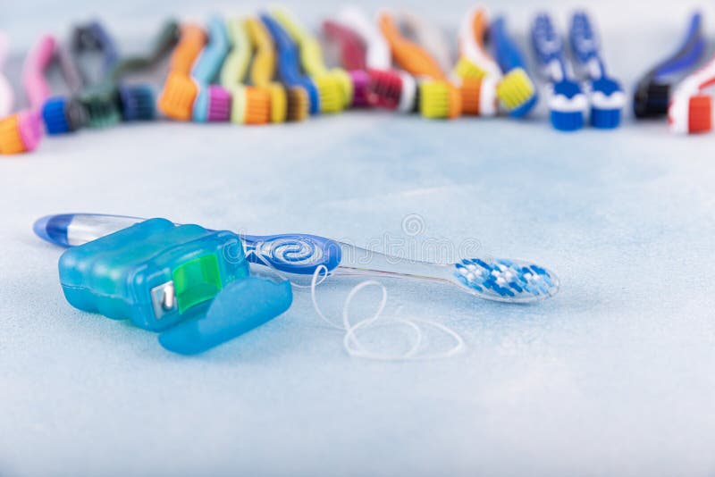 Toothbrush and Dental Floss. Set of Colorful Toothbrushes with ...