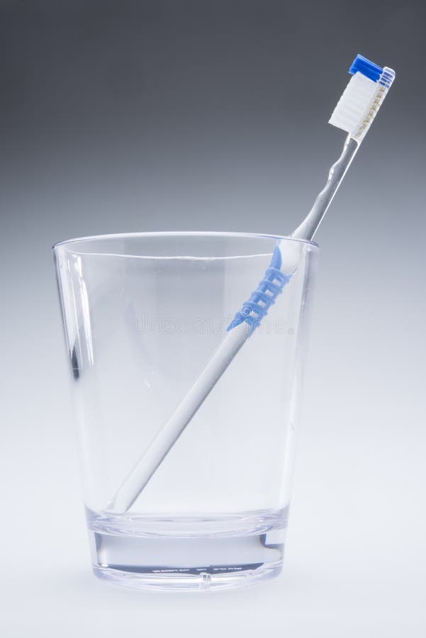 Toothbrush in a Glass stock photo. Image of clear, still - 96712854