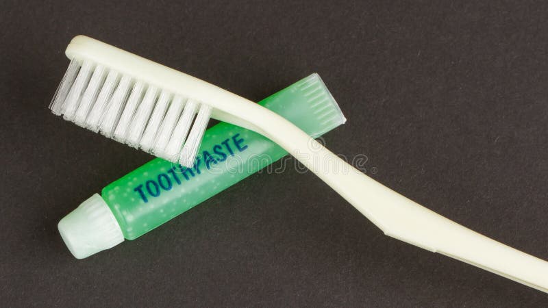 Toothbrush and Green Toothpaste Isolated Stock Image - Image of grey ...