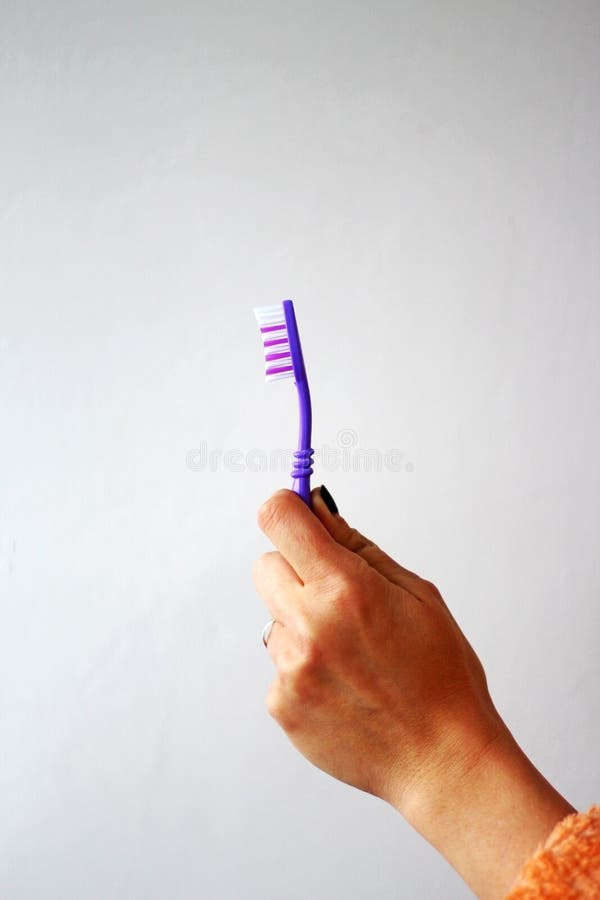 Toothbrush in the Hands of a Woman Stock Photo - Image of medical ...