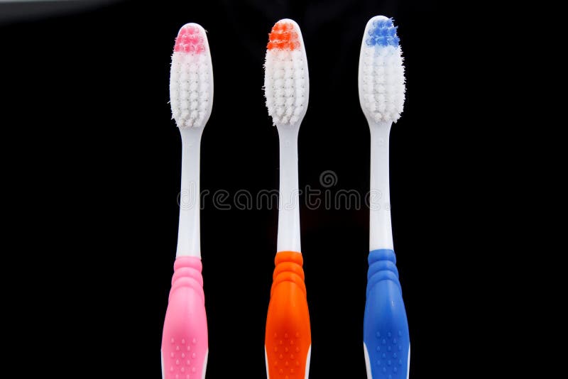 Toothbrushes of Assorted Colors in a Row Stock Photo - Image of color ...
