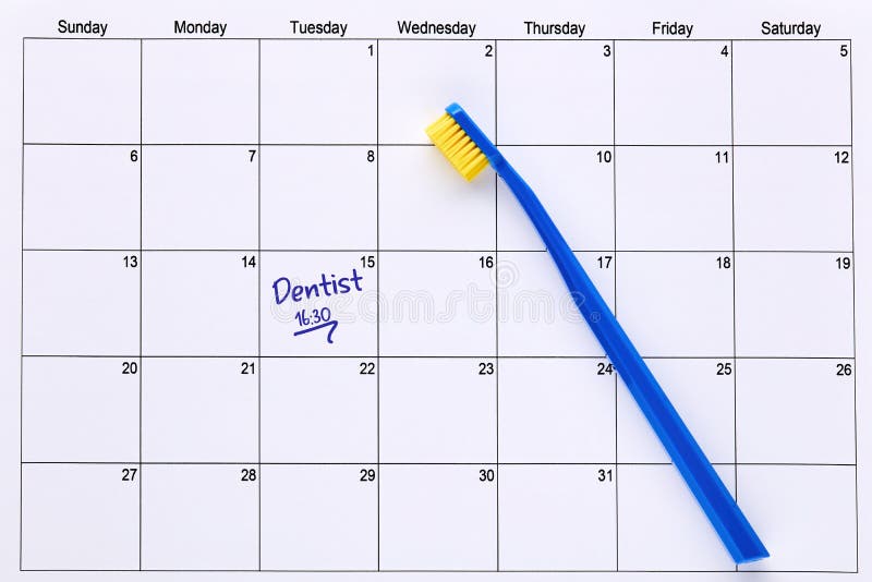 A Toothbrush and a Note of Dentist Appointment on Calendar Stock Photo ...