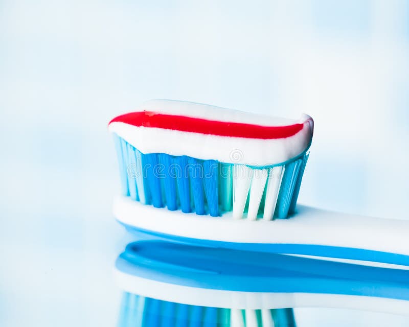 Toothbrush with Red Stripe Toothpaste Stock Image - Image of checked ...