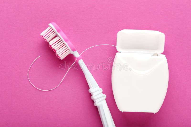Toothbrush with Tooth Thread Stock Photo - Image of paste, fluoride ...
