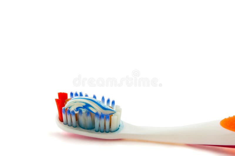Toothbrush with toothpaste stock photo. Image of object - 12836646