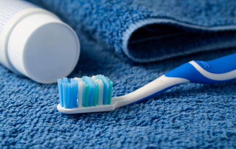 Toothbrushes, Toothpaste and Towels Stock Photo - Image of color ...
