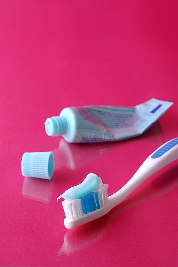 Toothbrush, Toothpaste and White Towels, Pink Flowers with Soap ...