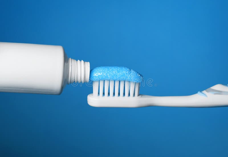 Toothbrush with Toothpaste Blue Background Stock Image - Image of ...