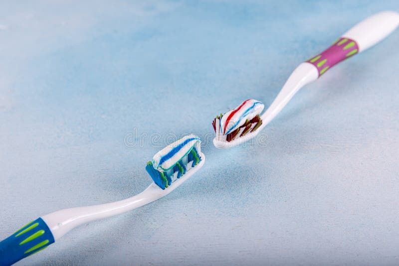 Toothbrush with Toothpaste on Blue Background. Toothpaste Extruded from ...