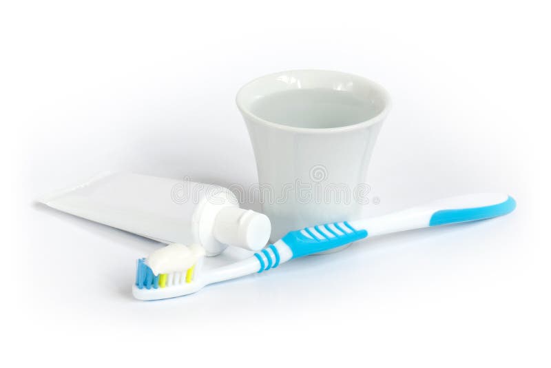 Toothbrush, Toothpaste and a Cup of Water. Stock Photo - Image of brush ...