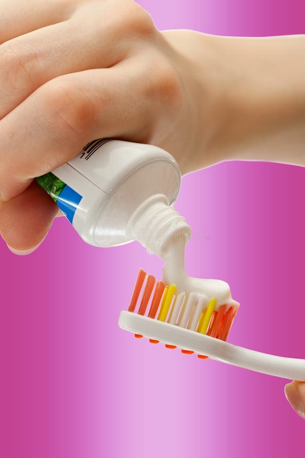 Toothbrush and Toothpaste in Female Hands Stock Photo - Image of brush ...
