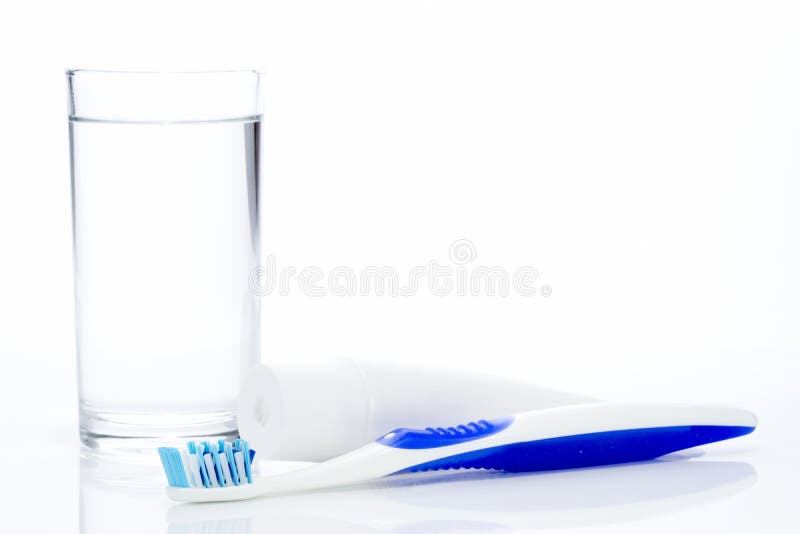 Toothbrush with Toothpaste and Glass of Water Stock Image - Image of ...