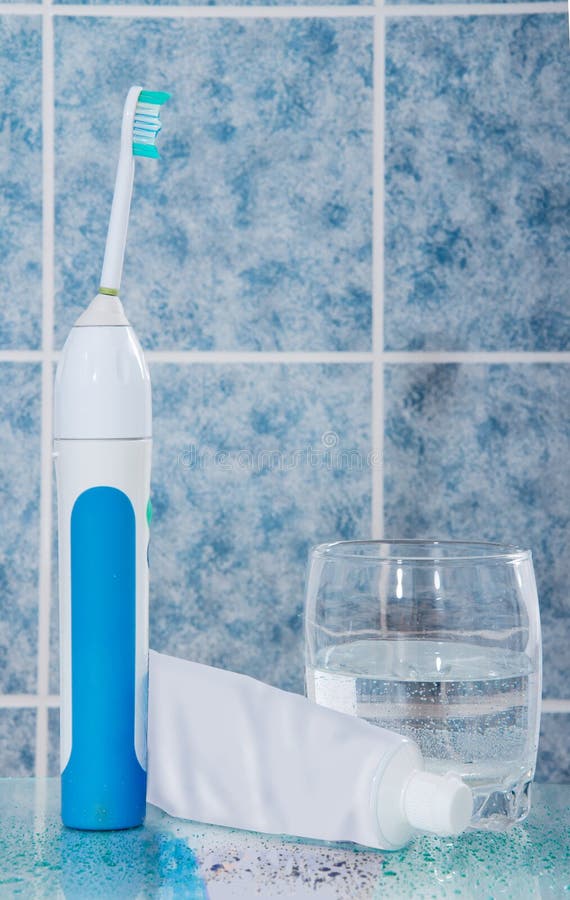 Toothbrush with Toothpaste and a Glass of Water Stock Image - Image of ...