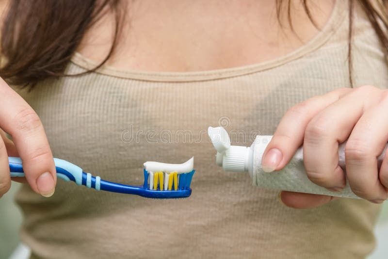 Toothbrush and Toothpaste in a Hand Stock Image - Image of closeup ...
