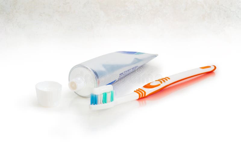 Toothbrush with Toothpaste and Open Tube of Toothpaste Stock Photo ...