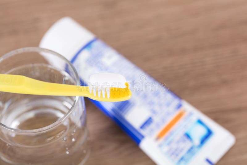 Toothbrush and Toothpaste on the Towel for Washing in the Morning Stock ...