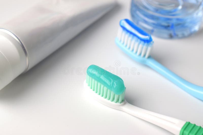 Toothbrush and Toothpaste on White Table Stock Photo - Image of ...