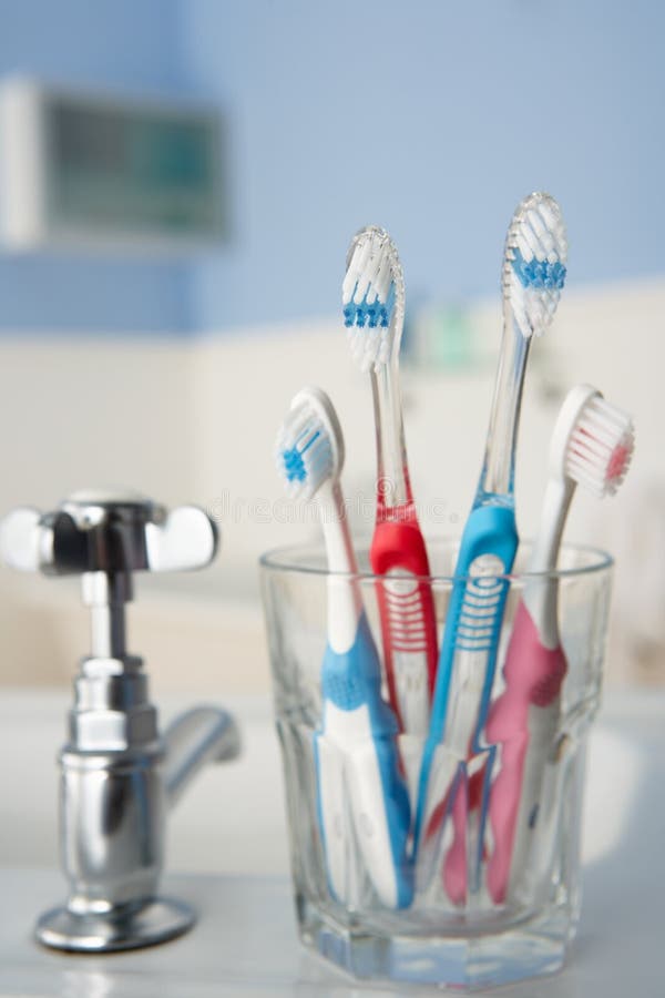 Toothbrushes in bathroom stock image. Image of sink, blue - 22002039