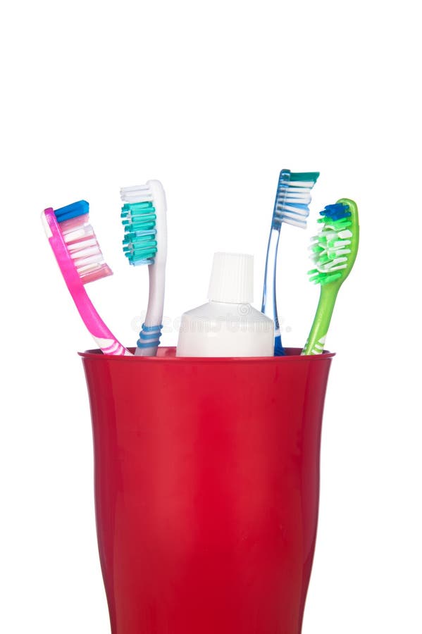 Toothbrush and Razor in Cup Stock Photo - Image of bathroom, comb: 4066910