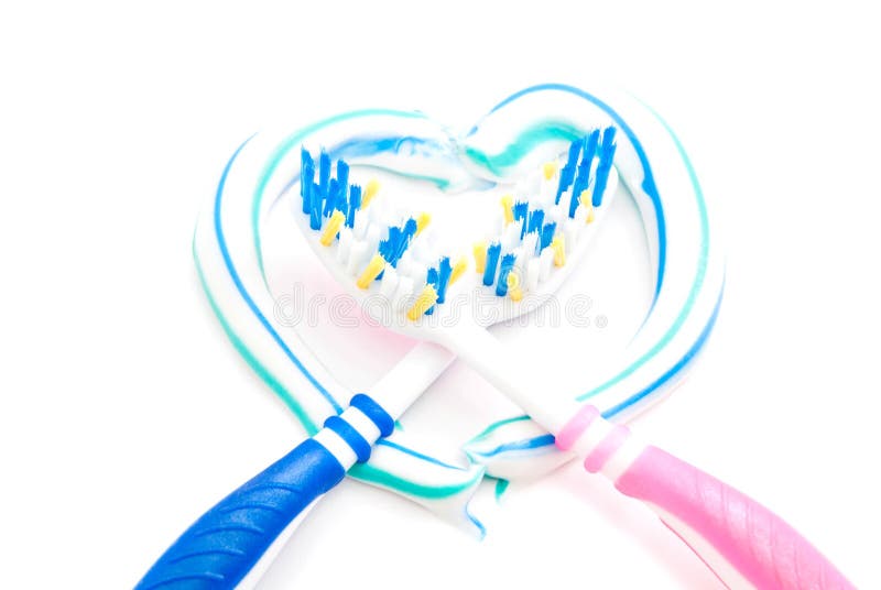 Toothbrushes in heart stock photo. Image of background - 64255200
