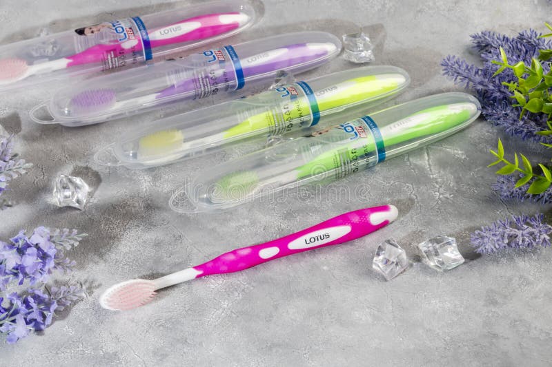 Toothbrushes in Plastic Packaging on a Gray Background. Ready for Sale ...