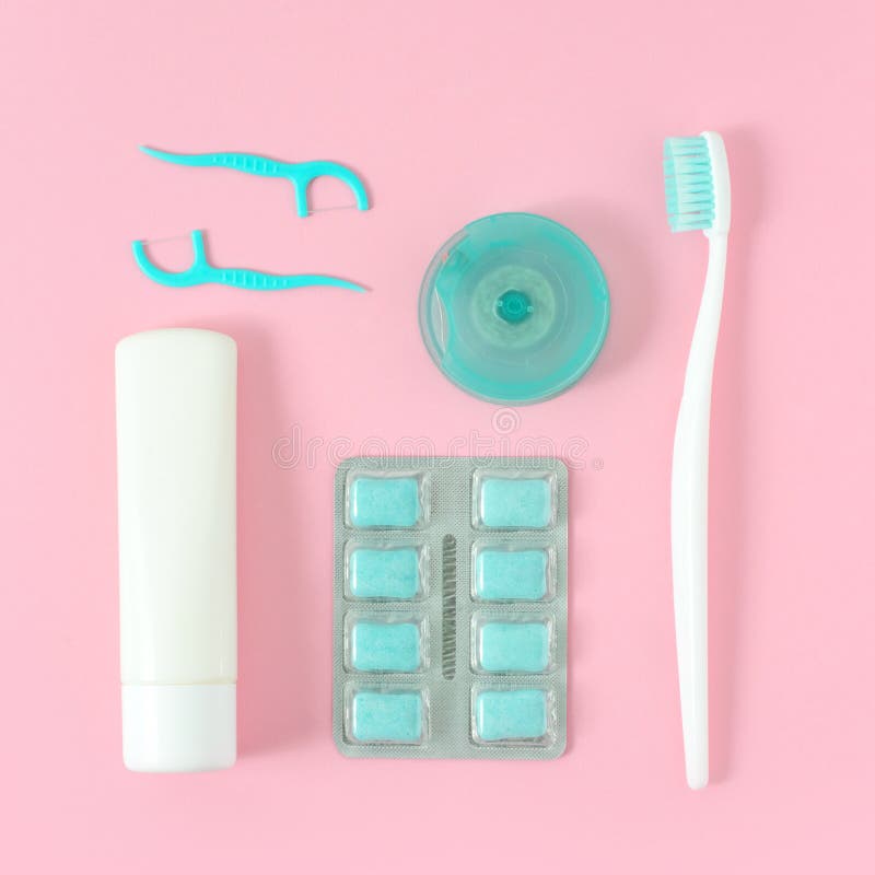 Toothbrushes, Toothpaste, and Chewing Gum Set on Pink Background. Stock ...