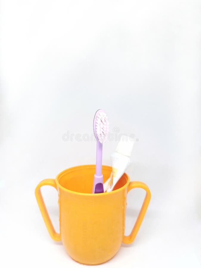 Toothbrushes, Toothpaste and Children`s Glasses. Stock Image - Image of ...