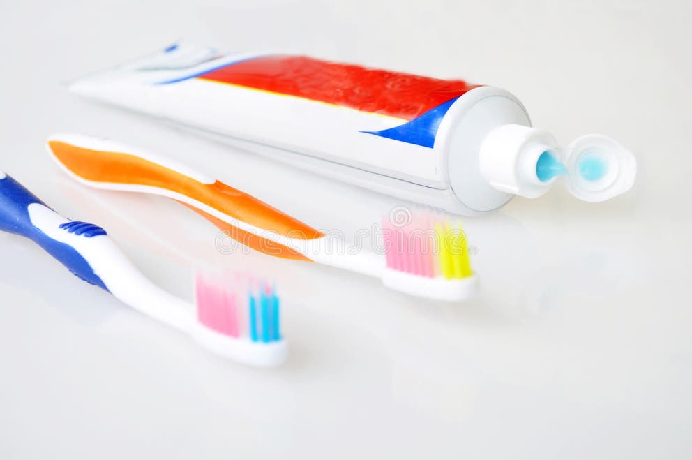 Toothbrushes and tube stock photo. Image of colourful - 19620264