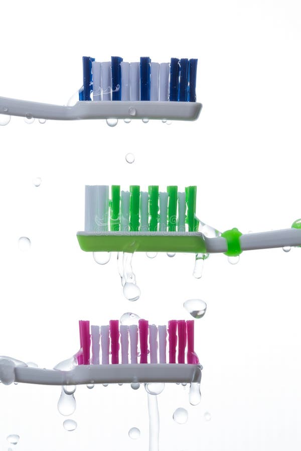 Toothbrushes Under Splashing Water Stock Photos - Free & Royalty-Free ...