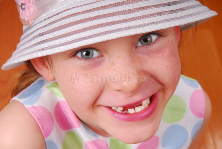 Toothless Girl in Hat stock photo. Image of relaxed, dress - 5112422