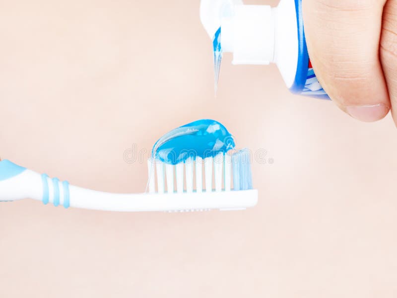 Toothpaste is Applied To the Toothbrush,tooth Brushing Close Up Stock ...