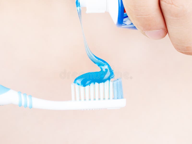 Toothpaste is Applied To the Toothbrush,tooth Brushing,oral Cleaning ...