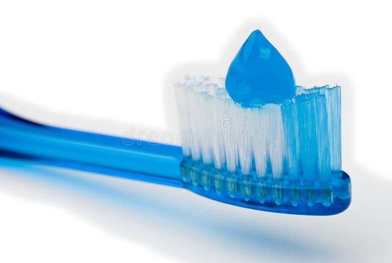 Toothpaste on Blue Toothbrush, on White Stock Photo - Image of care ...