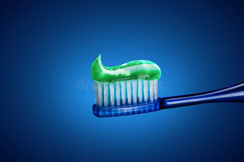 Toothpaste on a Brush. Green Toothpaste with Crystals Stock Photo ...